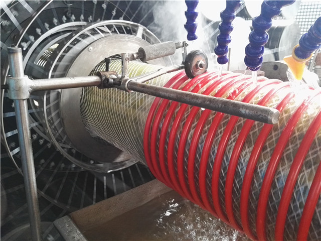 Fabric reinforced heavy duty spiral PVC suction hose extrusion line